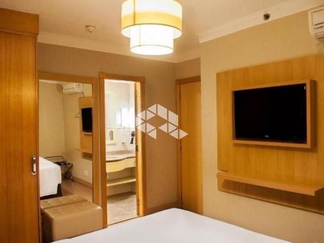 FLAT com sacada em Porto Alegre no bairro Moinhos de Vento