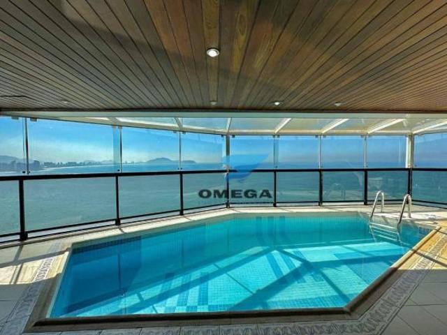 FRENTE MAR Apartamento de luxo à venda na praia das Astúrias, com 4 Suítes, lazer de clube e 3 vag