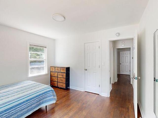 Fresh & Inviting Atlanta Home | Furnished, Secure, and Spacious | No Move In Fee, Free Wi Fi, Monthly Cleanings, Bus Stop 0.6 Mile Away, and Grocery Store 0.6 Miles Away