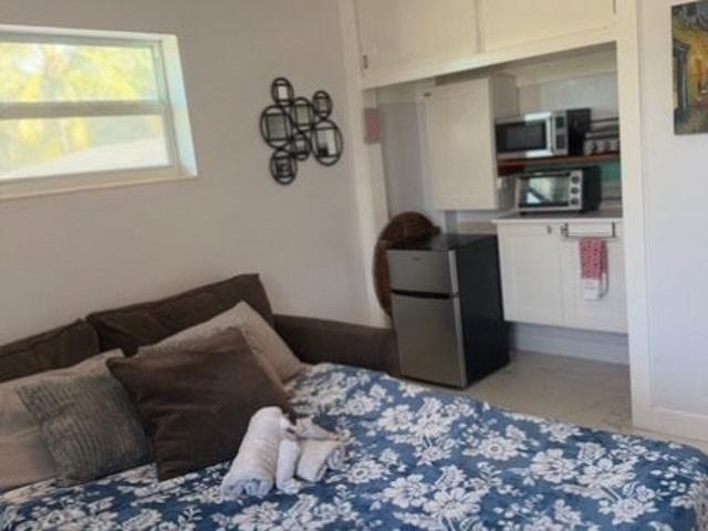 Fully furnished room with kitchenette
