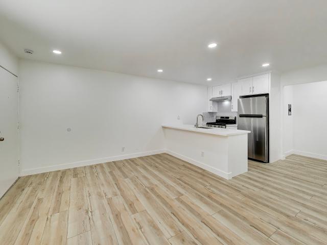 Fully Renovated Modern 2BR with Designer Kitchen & Parking Available