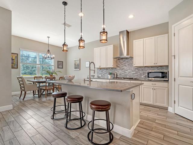 Furnished 4 Bedroom Home with Pool in The Sought After Neighborhood Of Rivo Lakes!