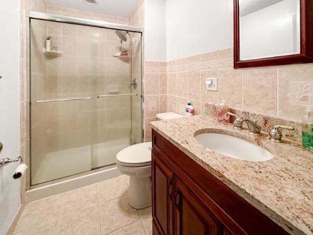 Furnished Bedroom with Ensuite Bathroom and Home