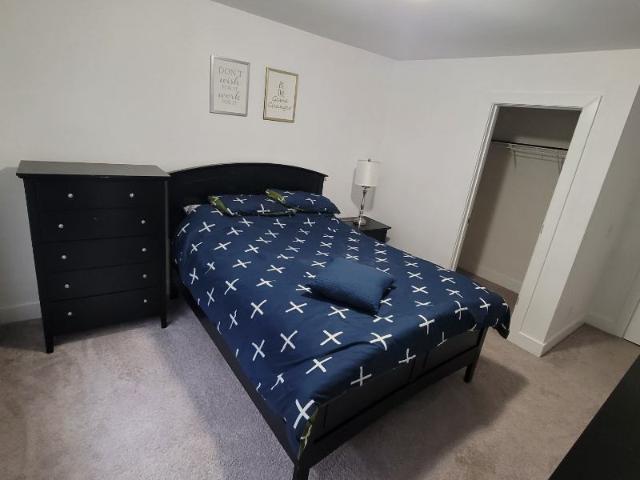 Furnished Bedroom with Shared Bathroom