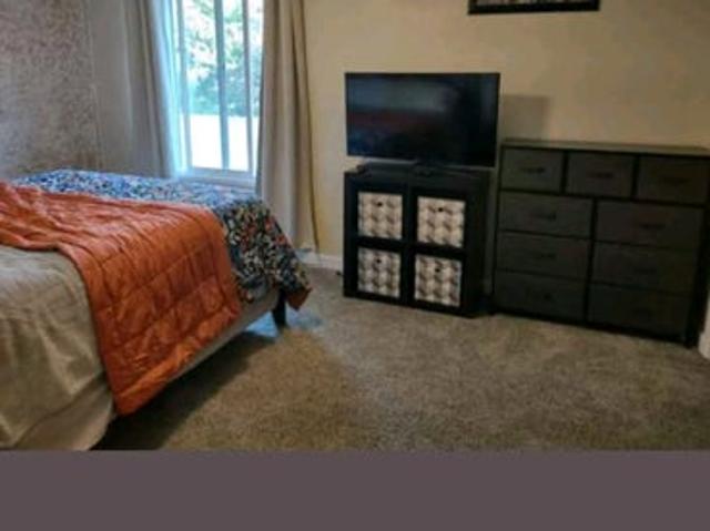Furnished bedroom in a small community