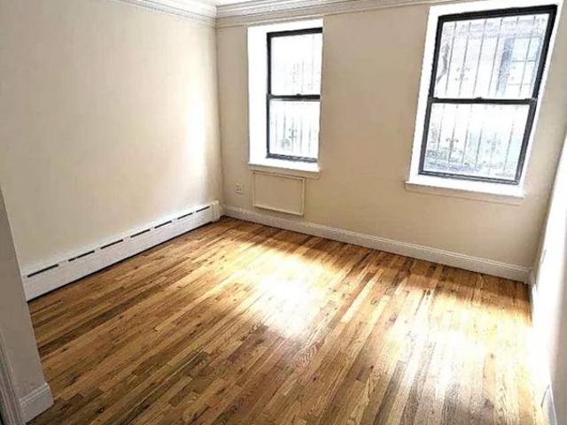 Furnished bedroom in heart of Hells Kitchen!