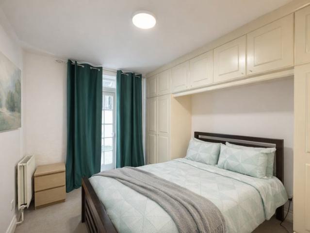 Furnished Large One Bedroom with Private Patio