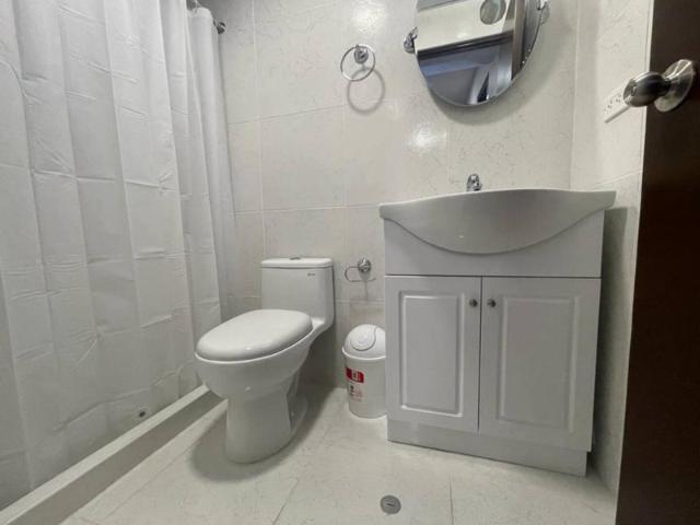 Furnished master bedroom with personal bathroom