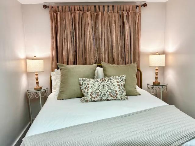 Furnished master bedroom with personal bathroom