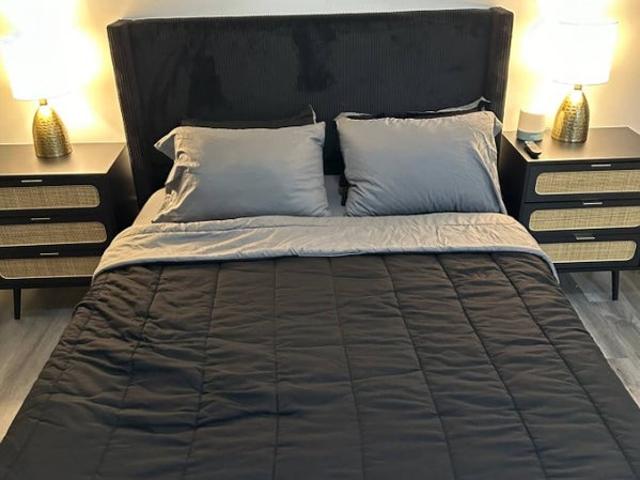 Furnished private bedroom with a private bathroom