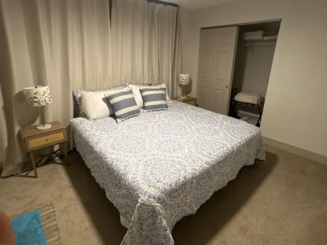 Furnished private bedroom with a private bathroom