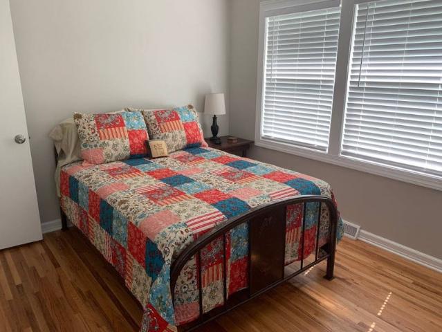 Furnished private bedroom with a private bathroom