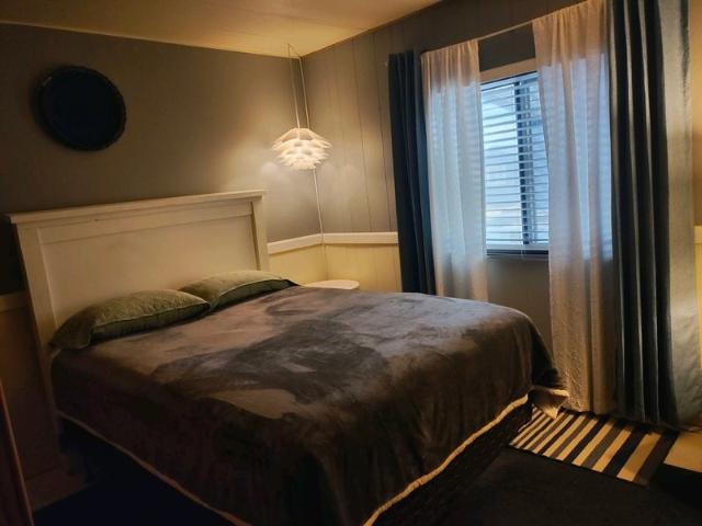 Furnished room with attached private bath