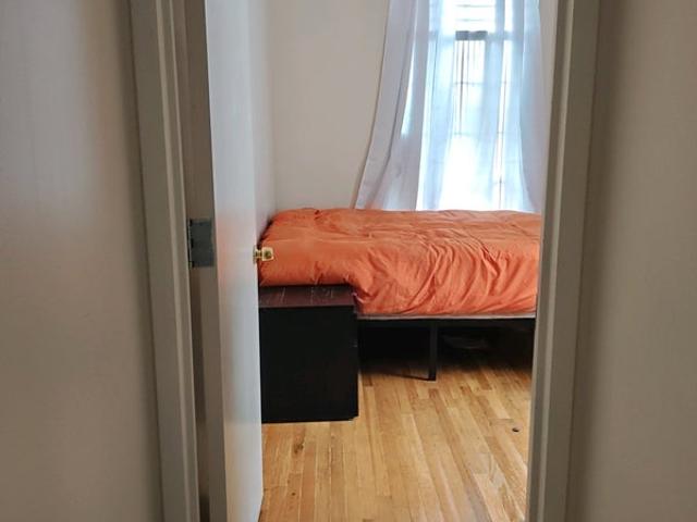 Furnished room with closet