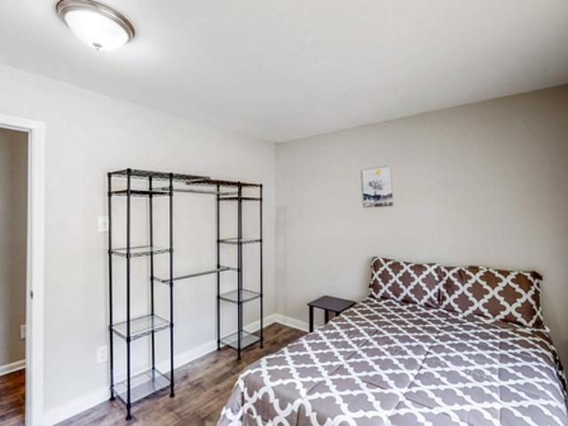 GOLD STAR RATING DON’T MISS THIS! Skip the Drive! Walk to Transit from This Spacious Brick Beauty!