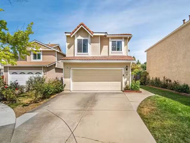 Gorgeous FULLY REMODELED 4 bedroom with east facing front doo.