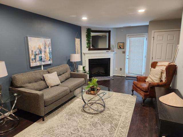 Gorgeous, spacious, and bright 3 bedroom with 3.5 baths. Updated dark floors, kitchen with hardwoods, lots of storage and closet space. Includes stove, microwave, dishwasher, fridge, washer AND dryer! Pantry and ample cabinets.