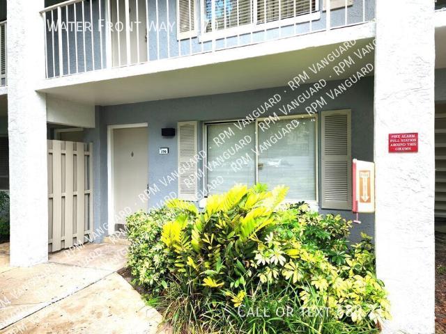Ground Floor Condo Unit  Screened in Patio  All Tile Flooring  Water Included