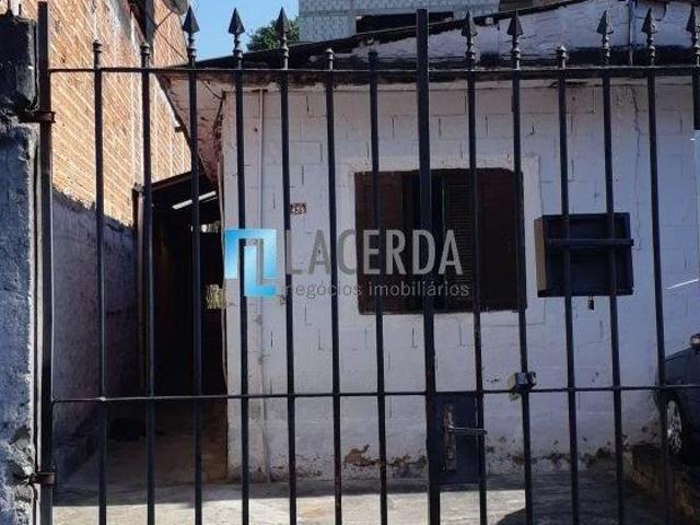 GRANDE TERRENO COM CASAS