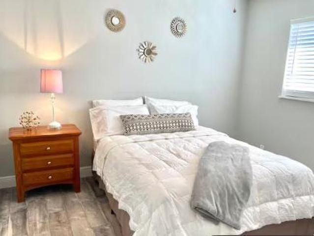 High Quality Pool Home 5 Minutes Walking Distance from Winn Dixie Living Room Included!