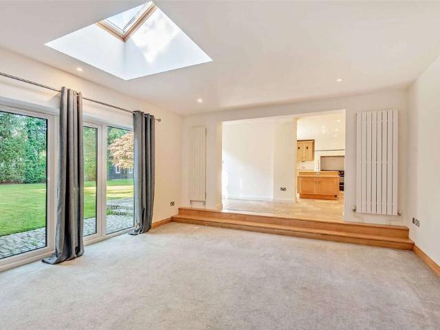 High specification gated home with fabulous South facing garden, well located on one of on the most sought after roads in Cheshire