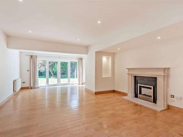 High specification gated home with fabulous South facing garden, well located on one of on the most sought after roads in Cheshire
