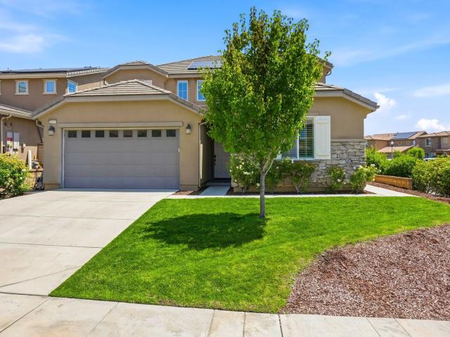Highly Sought After Next Gen Home with Private Downstairs Suite in Gated Valencia Community