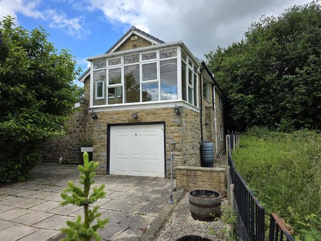 house in Birkenshaw Lane, Birkenshaw