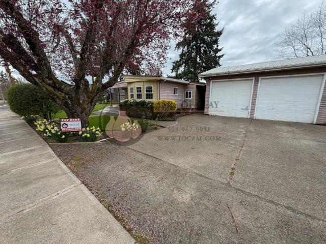 Hubbard Home with 2 Bay Shop, Office, & Massive Yard!