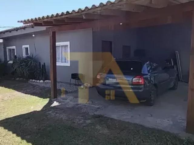 Imóvel Comercial de Alto Potencial em Campo Duna Imbituba SC: Terreno Amplo com Galpões e Moradia