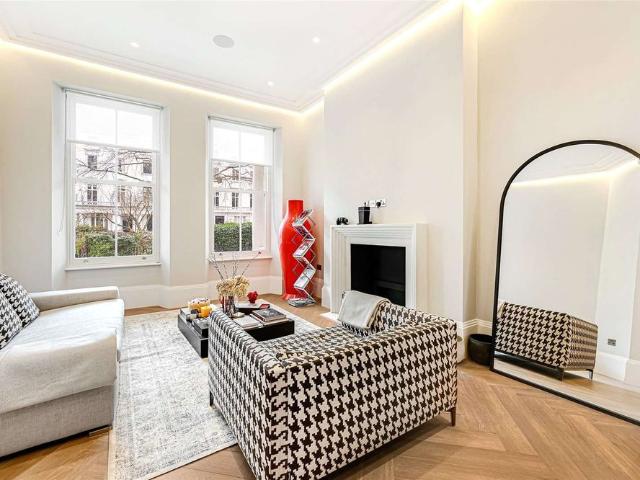 Immaculate brand newly refurbished three bedroom duplex apartment with private garden