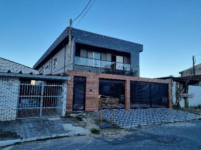 Imóvel com localização privilegiada — Casa no Vila Sao Jorge, Praia Grande SP, Nº 128, 2 quartos, 1 vaga, 56,19m² | Licitação Aberta