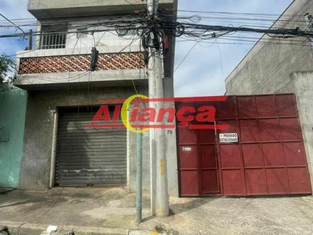 Imóvel com 2 casas, 5 vagas, 2 galpões, ideal para morar e empreender. Oportunidade!
