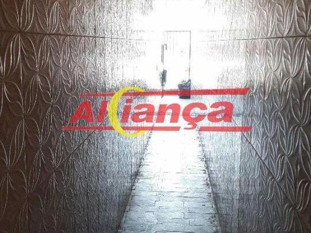 IMÓVEL COM 3 CASAS E UM SALÃO COMERCIAL NO JD. SANTA PAULA EM GUARULHOS, SP