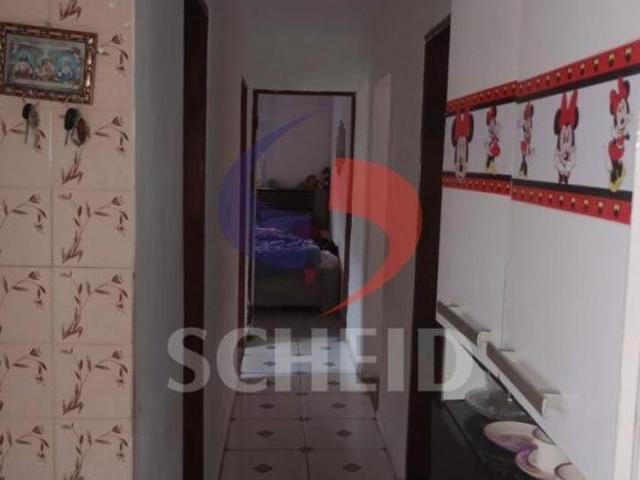 Imóvel á Venda de 345m², 03 casas na Vila Missionária, garagens, amplo quintal e terreno de esquina