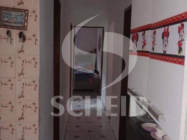 Imóvel á Venda de 345m², 03 casas na Vila Missionária, garagens, amplo quintal e terreno de esquina