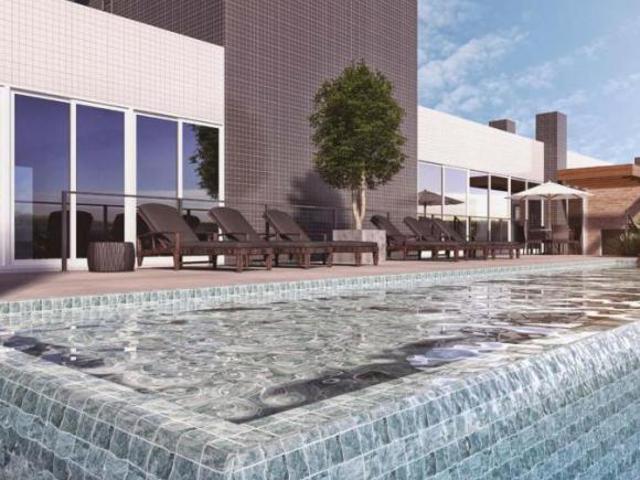 Imóvel à venda em Capão da Canoa: Apartamento com 2 suítes e churrasqueira