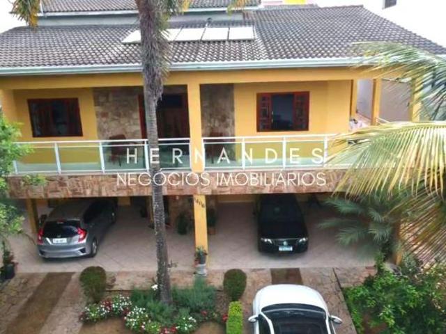 Imóvel no Tarumã com 456m² de terreno tendo 4dorm sendo 3suíte