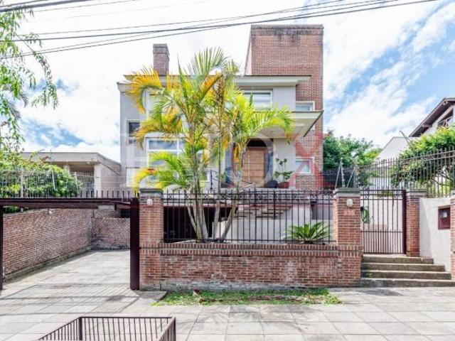 Impecável casa à venda em Porto Alegre RS, bairro Chácara das Pedras: 3 quartos, 1 suíte, 3 salas, 4