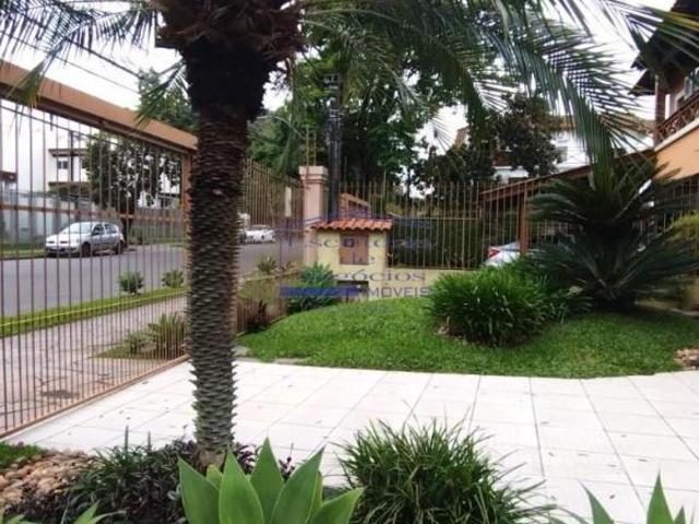 Impecável casa em condomínio à venda em Porto Alegre RS, bairro Ipanema: 3 quartos, 1 suíte, 3 salas