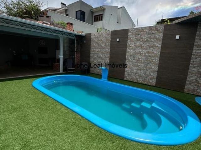 Impecável residência de 3 quartos com 2 suítes em Santo Ângelo RS, bairro Menezes: 2 salas, 3 banhei
