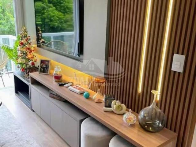 Imperdível oportunidade: Apartamento de 2 quartos com suíte, 2 salas e vaga de garagem em Nova Petró