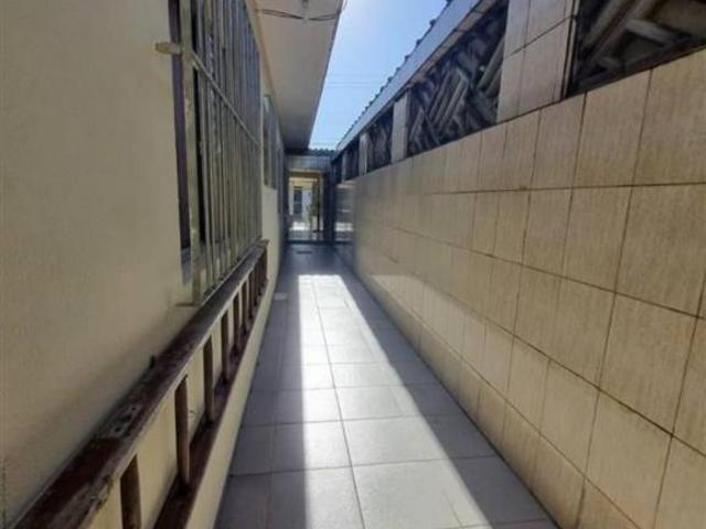 Imperdível oportunidade: Casa Geminada com edícula à venda em Praia Grande SP, Caiçara! 2 quartos, 1