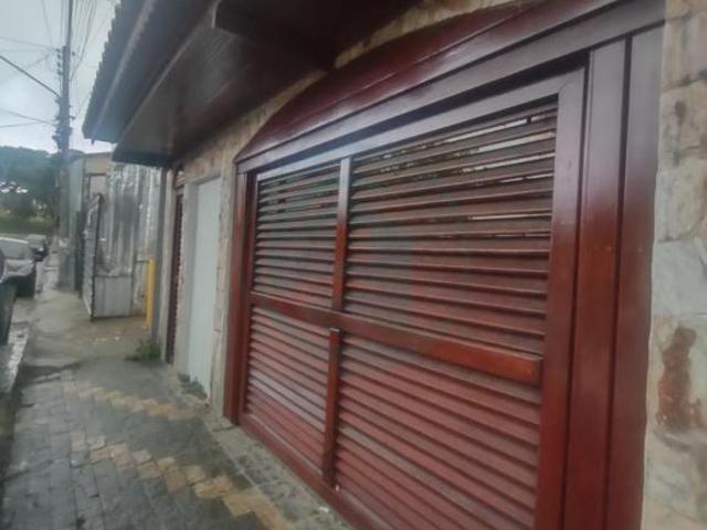 Imperdível: Casa à venda em Guarulhos SP, Garagem para até 4 carros, 4 suítes e muito mais!