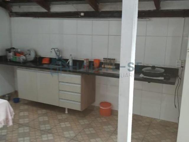 Imperdível! Casa à venda em Passos MG, bairro Nossa Senhora Aparecida: 4 quartos, 1 suíte, 2 salas