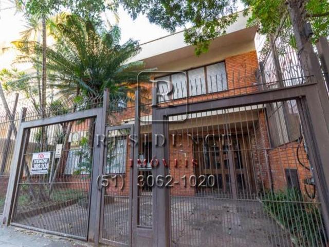 Imperdível Casa à Venda em Porto Alegre RS: 4 Quartos, 1 Suíte, 3 Salas, 1 Banheiro, 3 Vagas de Gara