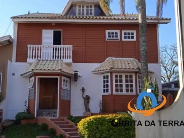 Imperdível casa de luxo com 5 quartos e 5 suítes no condomínio exclusivo de São Braz, Curitiba PR