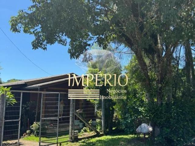 Imperdível Residência à Venda no Centro de Três Coroas RS: 2 Quartos, 1 Sala, 1 Banheiro, Garagem e