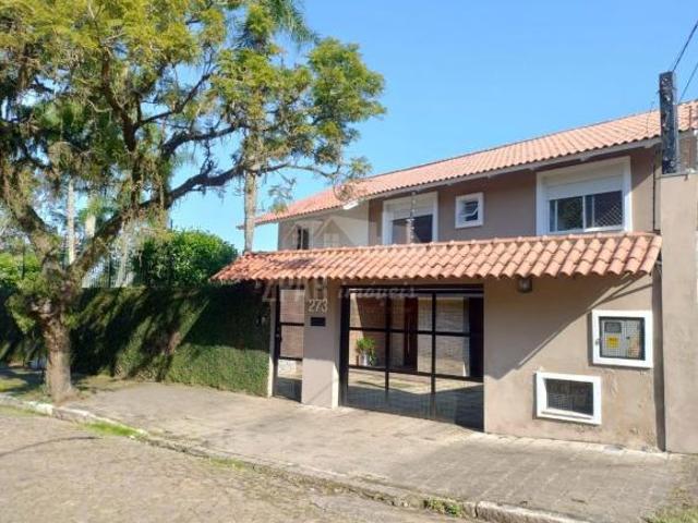 Imponente residência de alto padrão à venda no Guarujá, Porto Alegre RS: 3 quartos, 1 suíte, 3 salas
