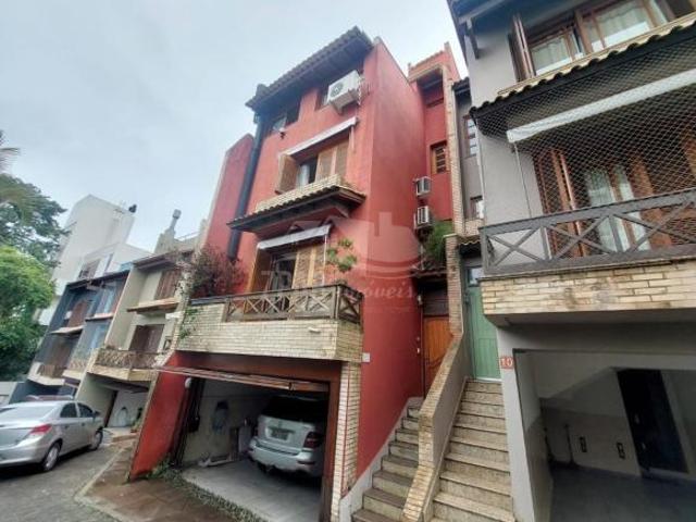 Imponente residência em condomínio à venda em Porto Alegre RS, bairro Tristeza 4 quartos, 3 suítes